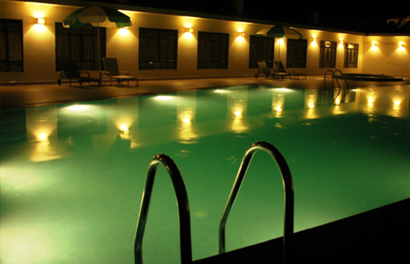 Beautiful night view of the swimming pool premises of the IORA Resort ...