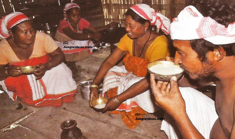 The Deori people savoring locally brewed rice beer at a local Deori ...