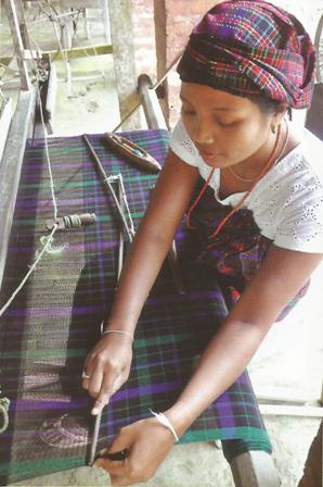 The Singpho tribal lady weaving on a traditional loom at a local ...